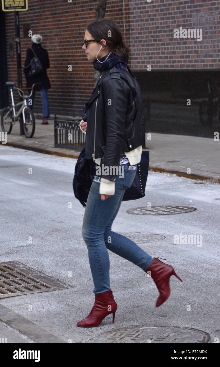 Katie Holmes looking fashionable in a leather motorcycle jacket as she ...