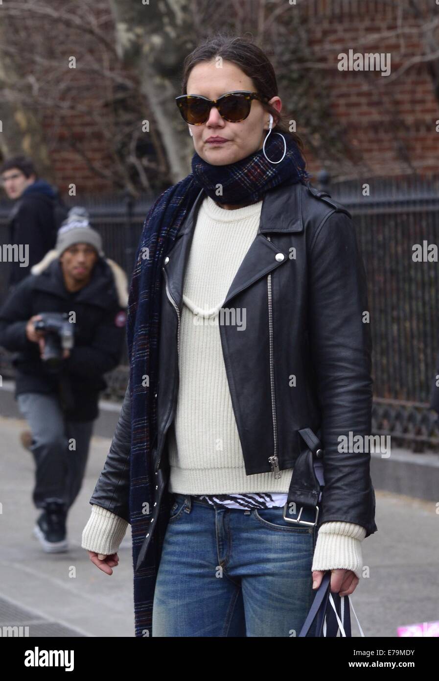 Katie Holmes looking fashionable in a leather motorcycle jacket as she ...