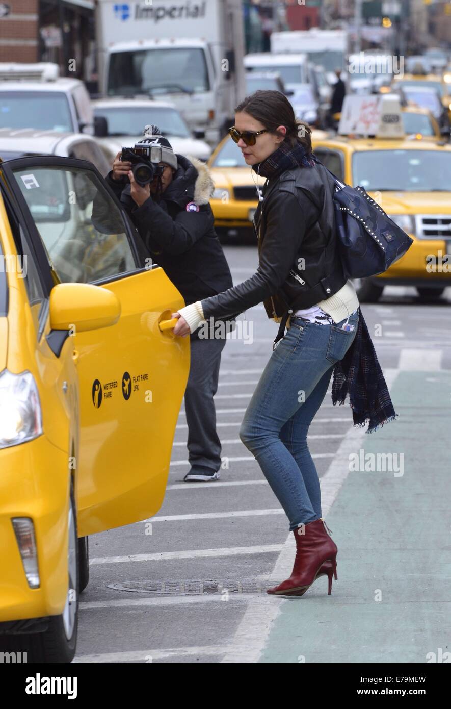 Katie Holmes looking fashionable in a leather motorcycle jacket as she ...