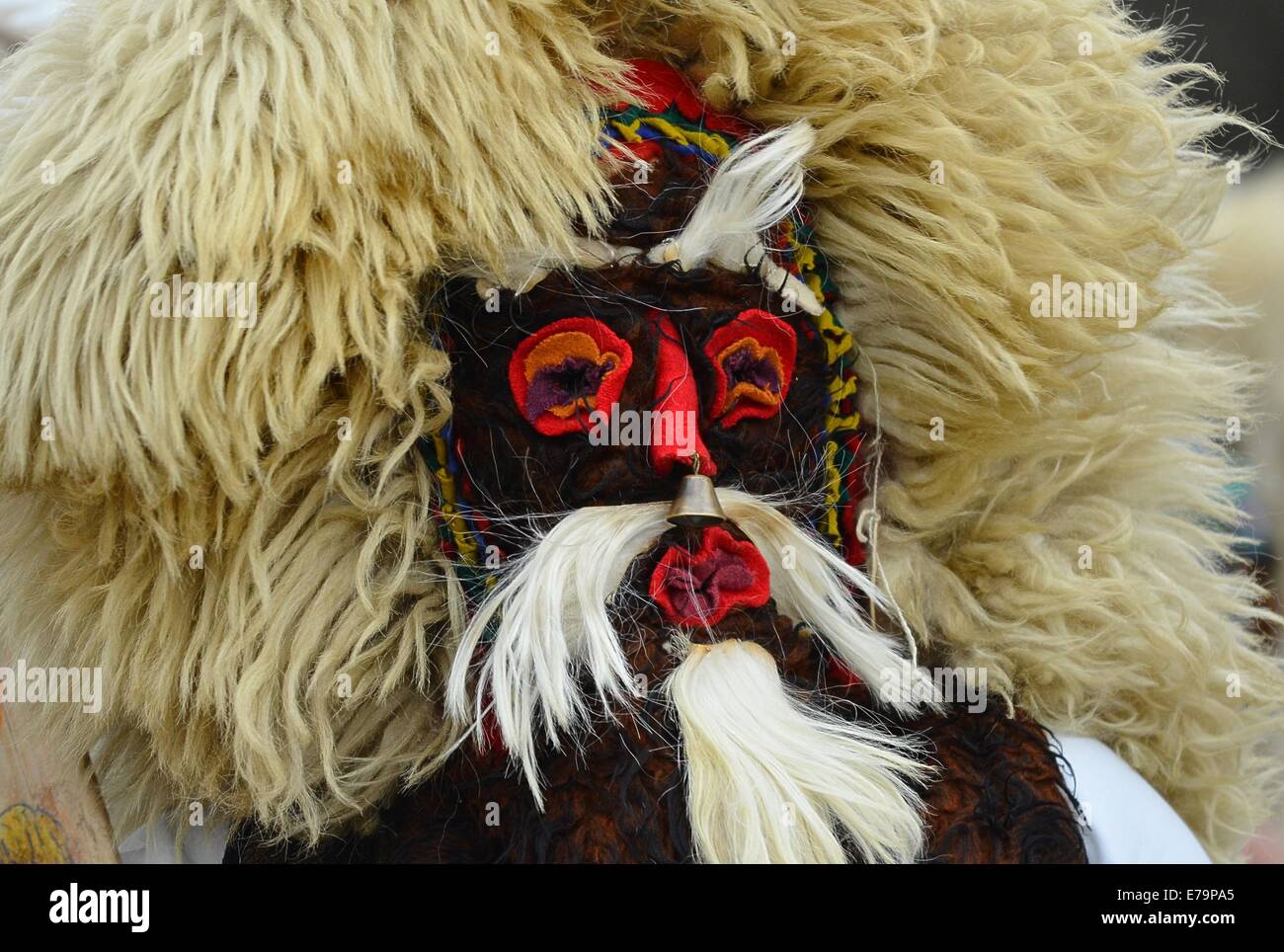 Masked people take part in a ritual dance during the three day ...
