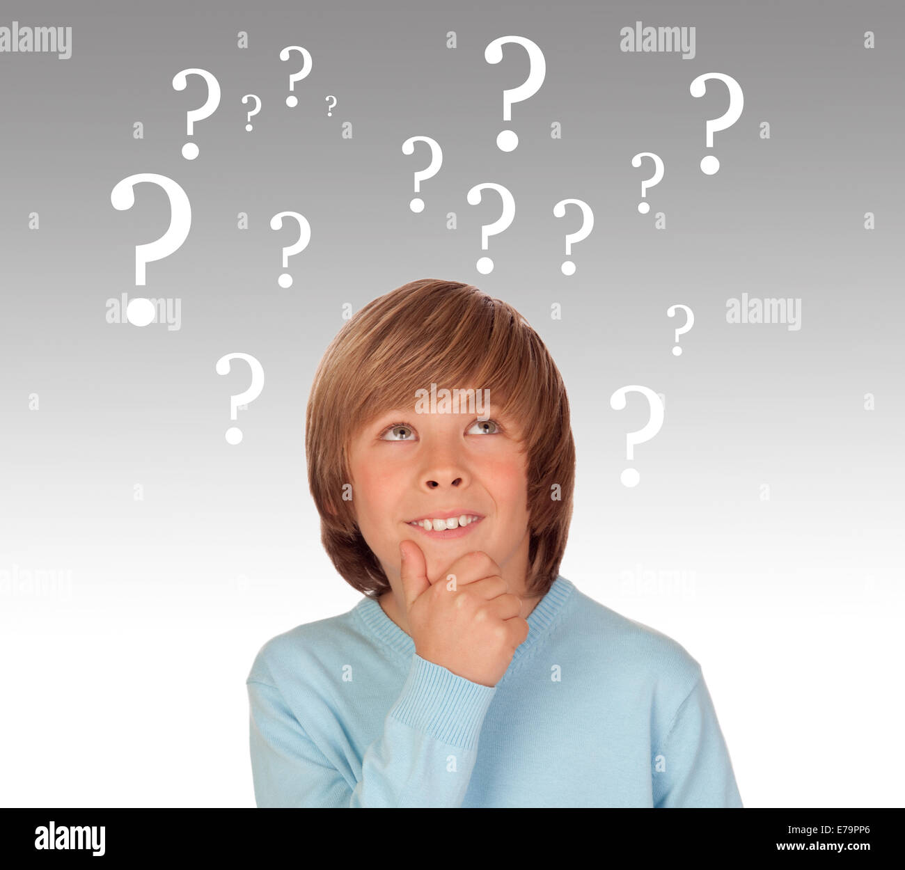 Doubtful preteen boy with many question symbols isolated on a over ...