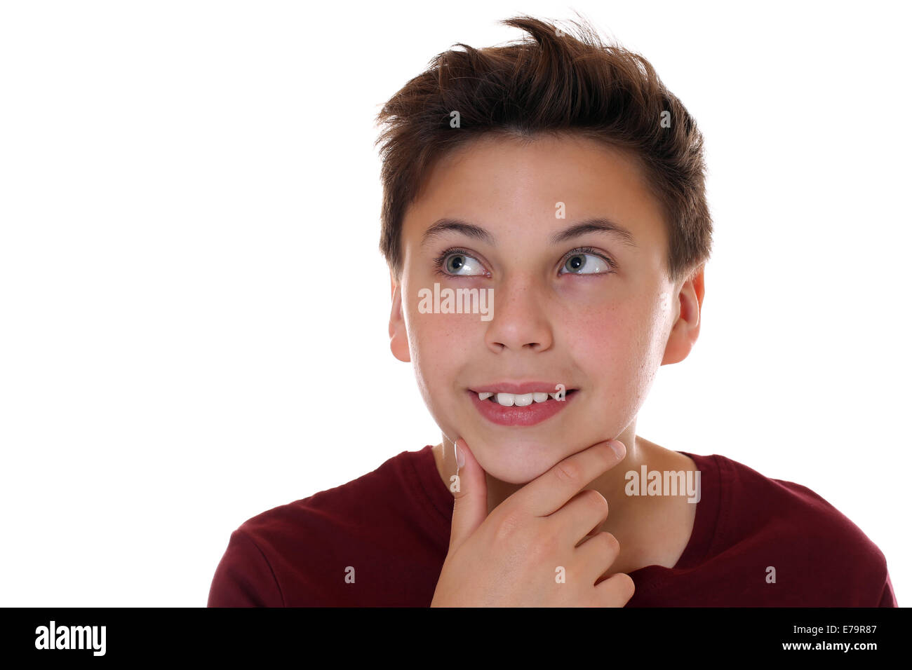 Young boy thinking, isolated on a white background Stock Photo - Alamy