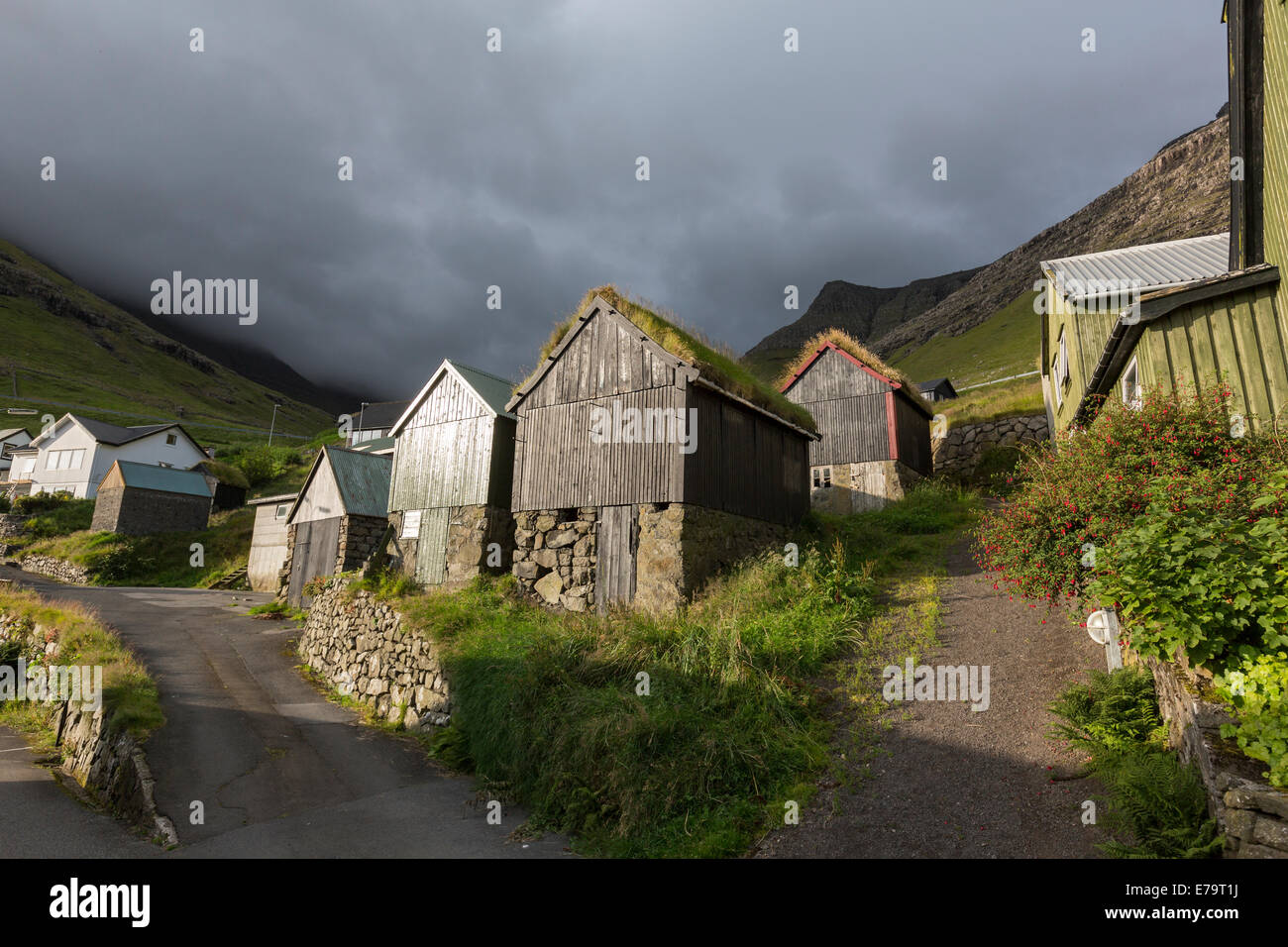 Bour with his little storage wooden grass turf covered cabin for ...
