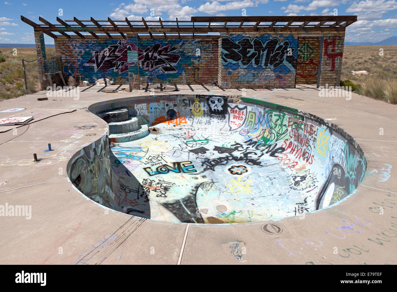 Graffiti filled pool at the Two Guns campground in Arizona. Two Guns is ...