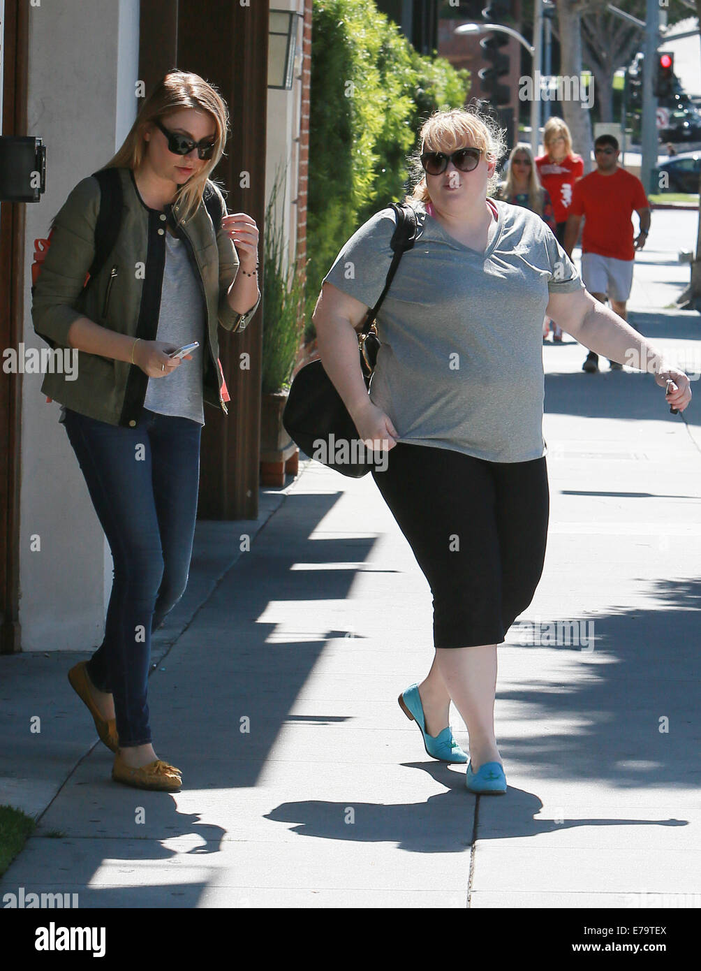 'Super Fun Night' star Rebel Wilson poses with a friend before heading ...