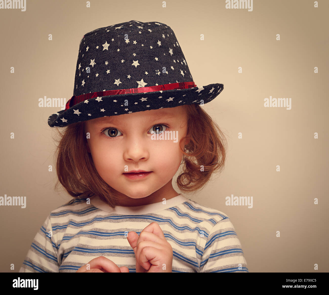 Wonder kid girl in trendy hat looking. Closeup vintage portrait Stock ...