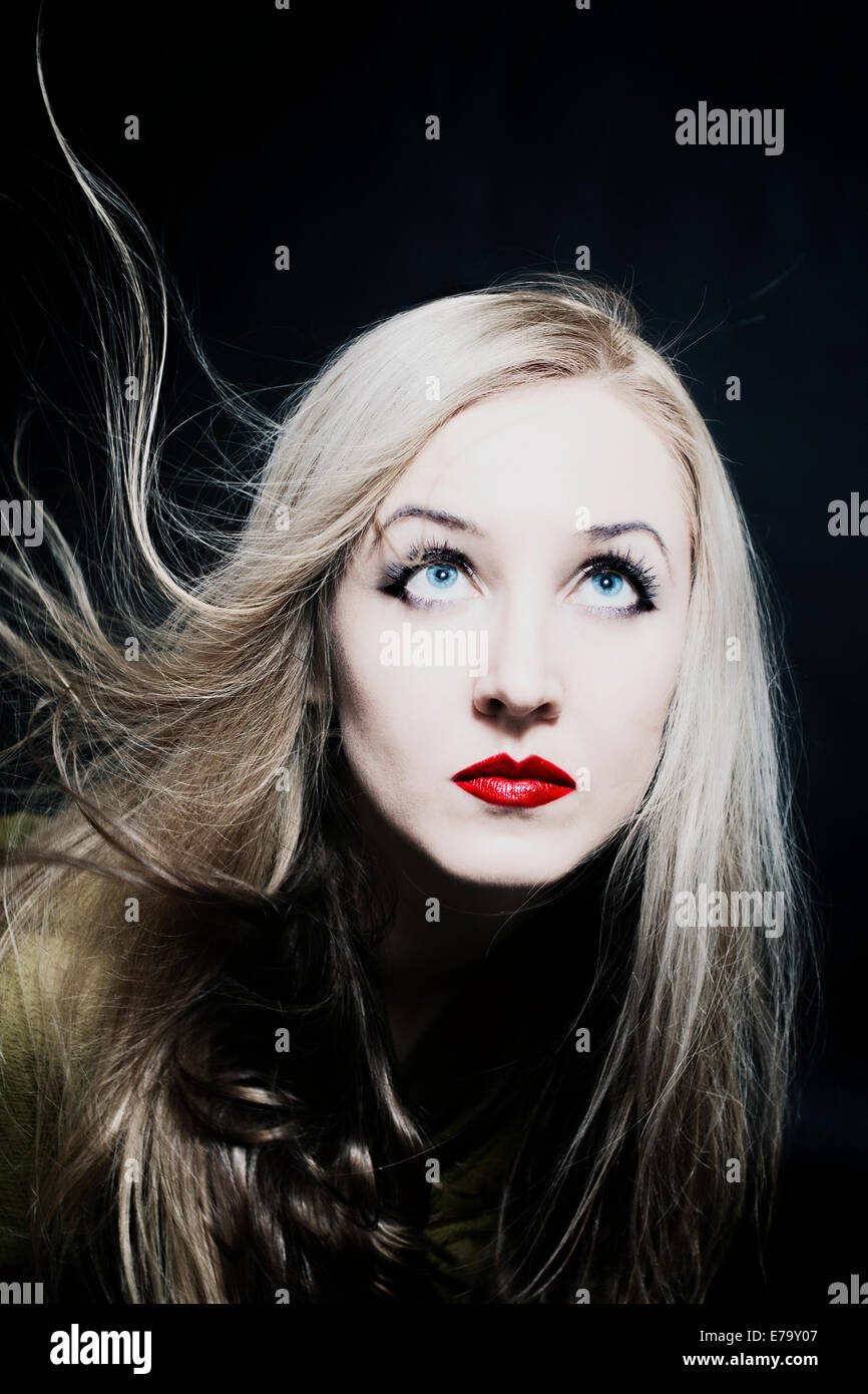 Healthy beautiful long hair in motion created by wind, fashion look ...