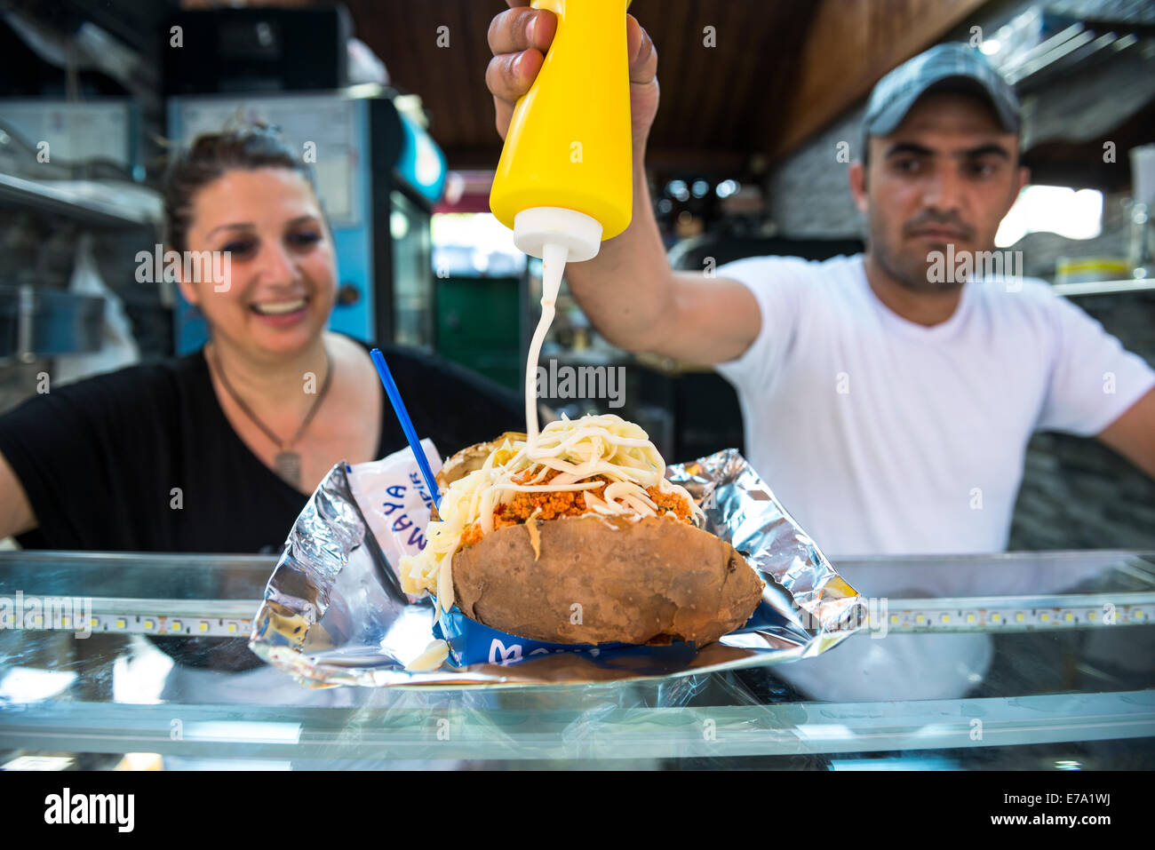 Kumpir- Istanbul style of baked potato stuffed with different fillings ...