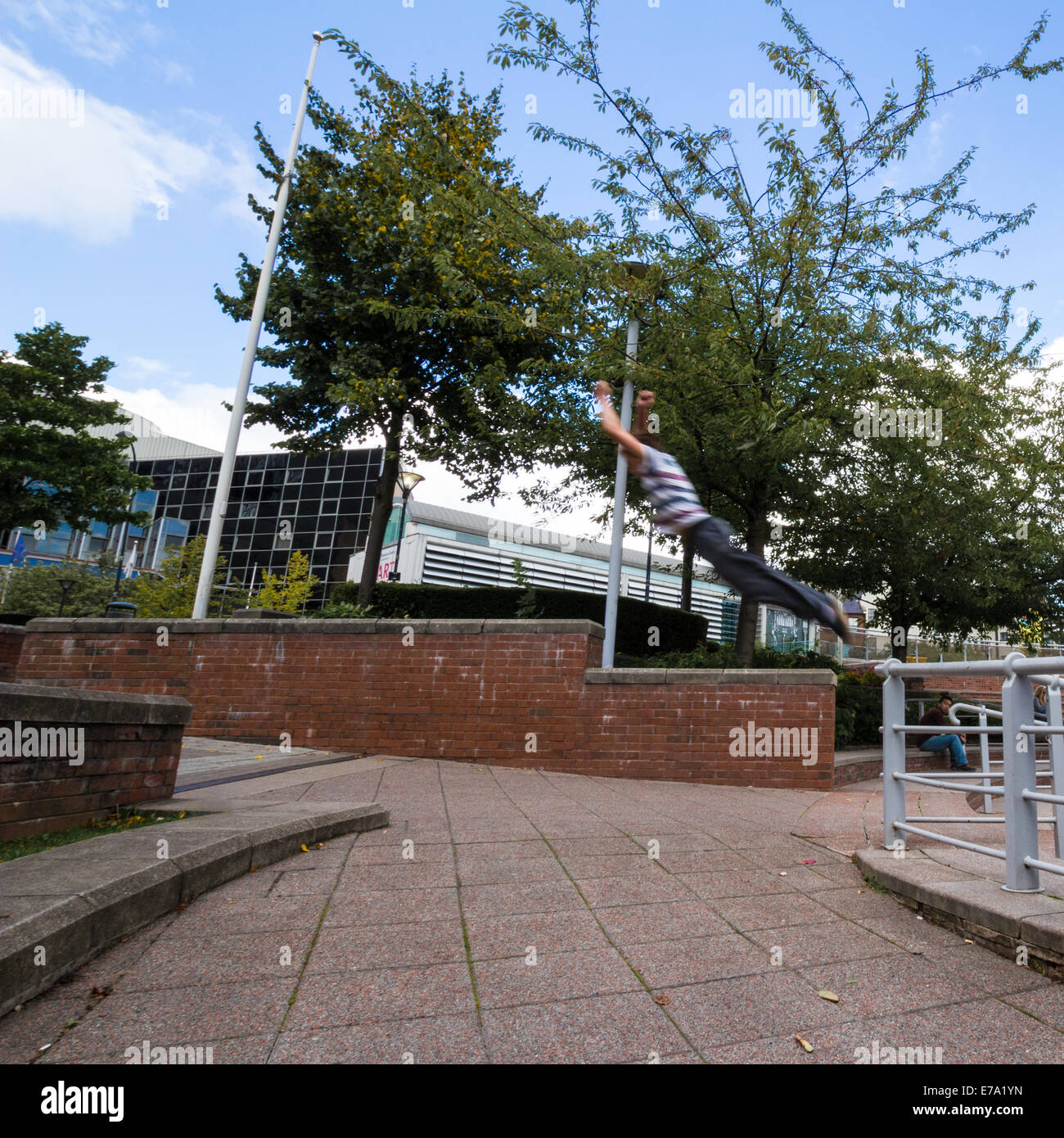 Precision Jump From a Rail Parkour Stock Photo - Alamy