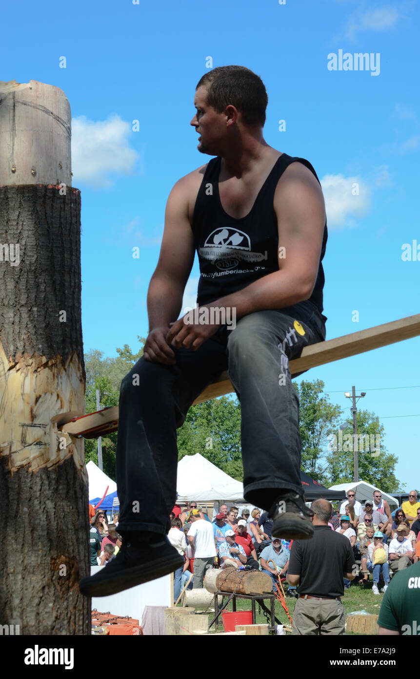 Lumberjack rests on spring board after winning best time in vertical in ...