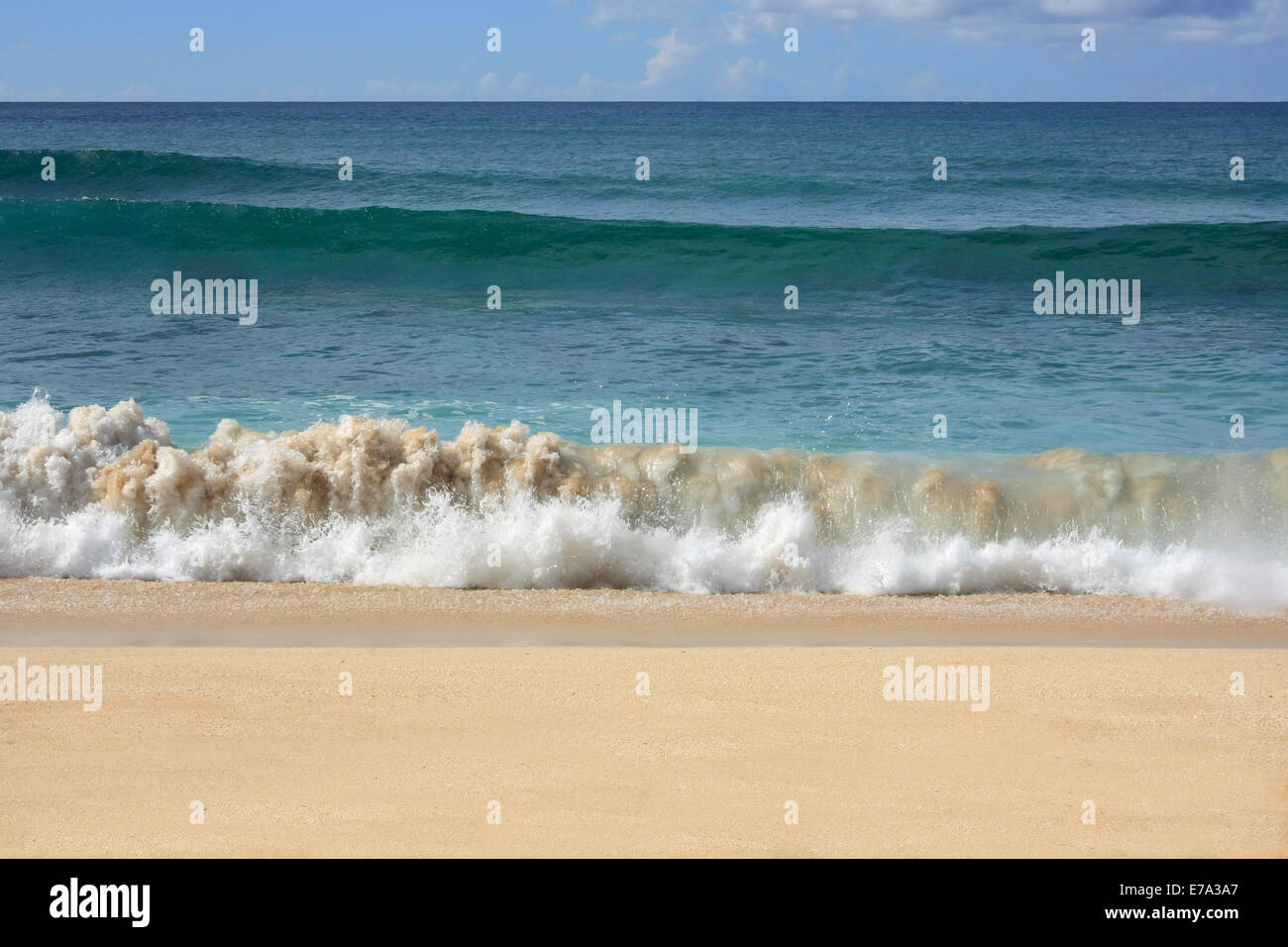 Untouched empty sandy beach with incoming waves with sand Stock Photo ...