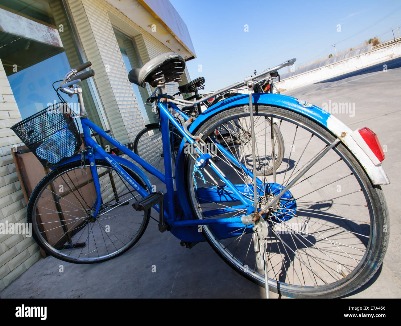 Blue Chinese bicycle with basket in rural China Stock Photo - Alamy