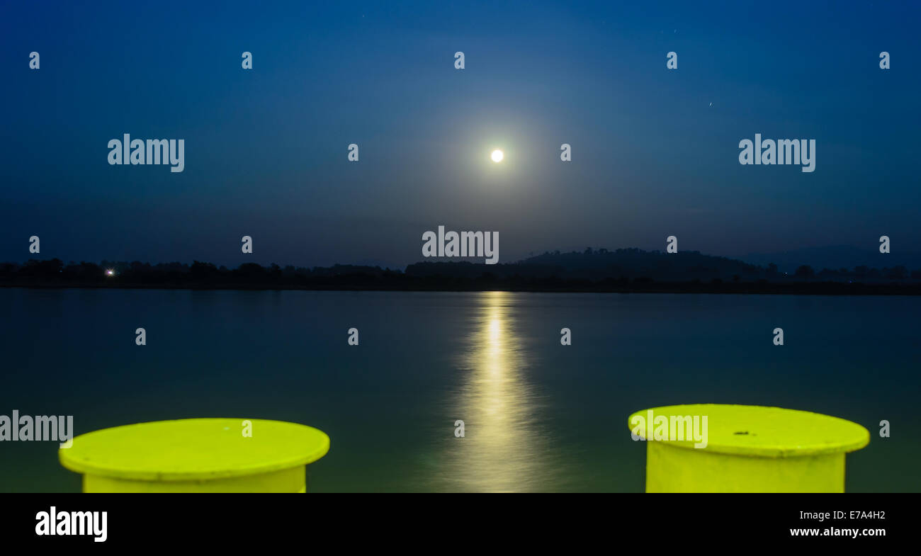 The Moon is rising and reflect the light on the River Stock Photo - Alamy