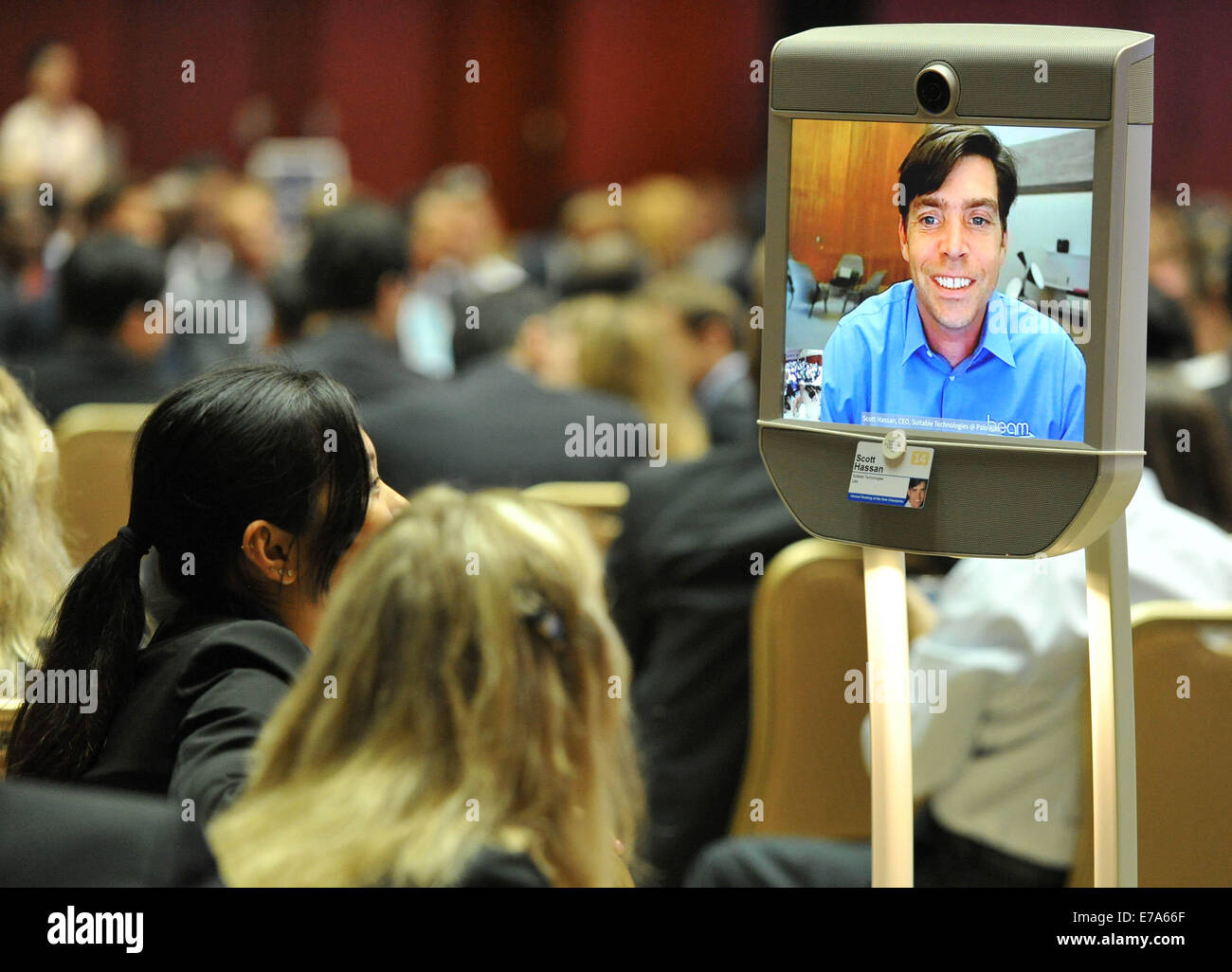 Tianjin, China. 11th Sep, 2014. Delegates talk with Scott Hassan, CEO ...