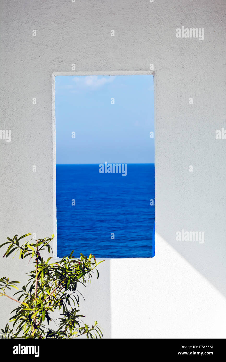 White window with a breathtaking view of the sea Stock Photo - Alamy