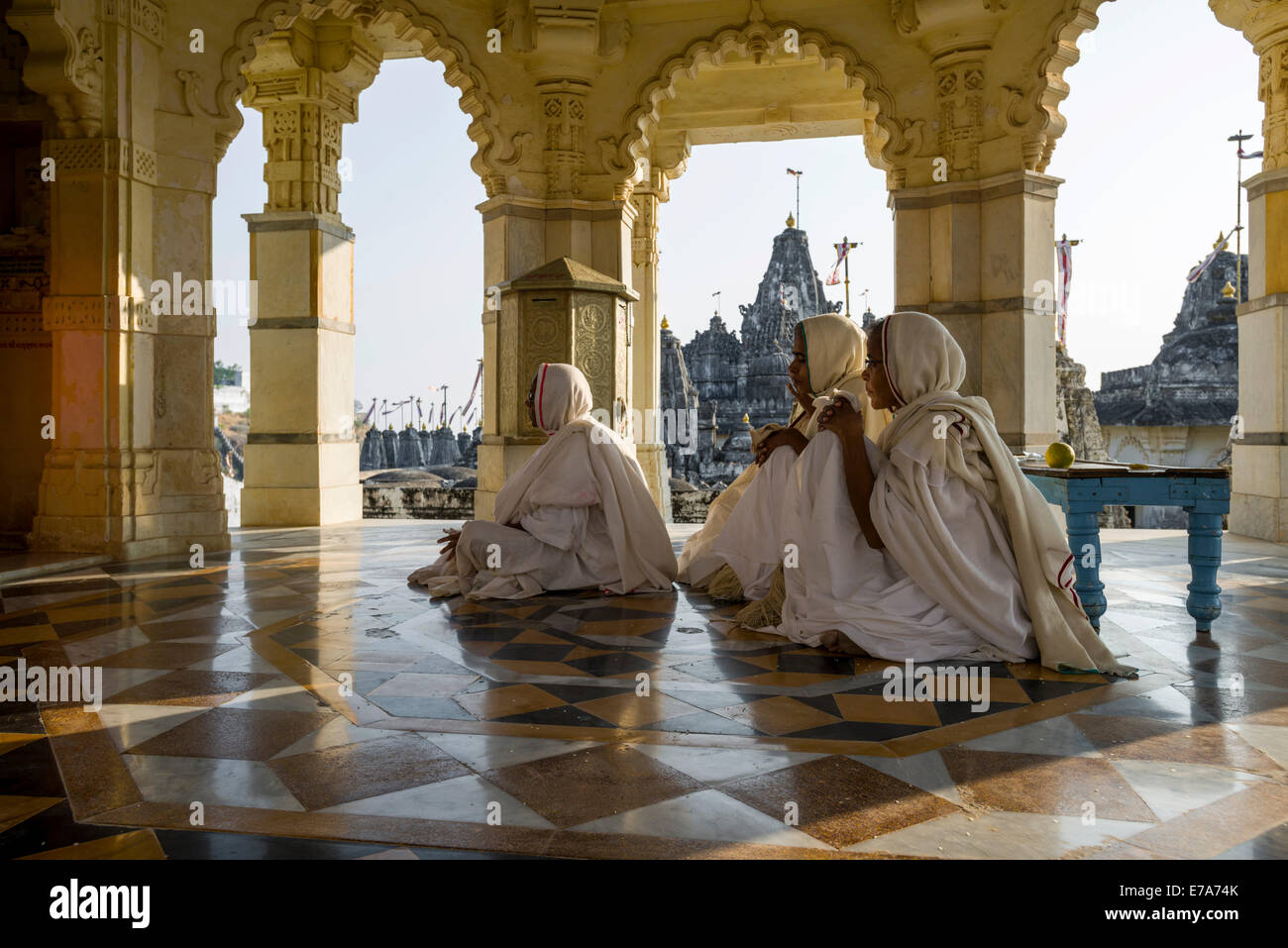 Jain nuns praying in a temple, Palitana temples, Mount Shatrunjaya ...