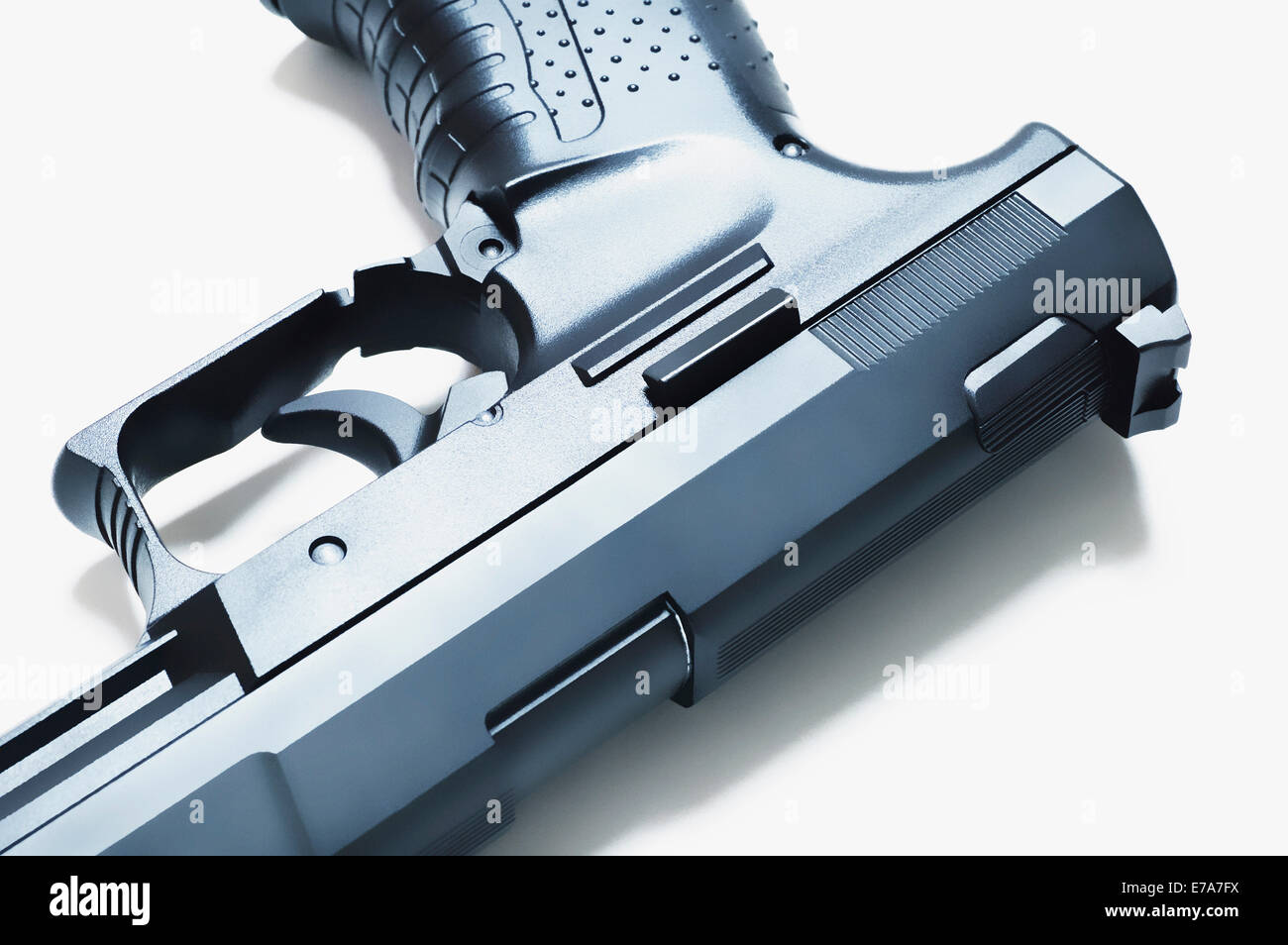 Close-up of a handgun, viewed upside down Stock Photo - Alamy