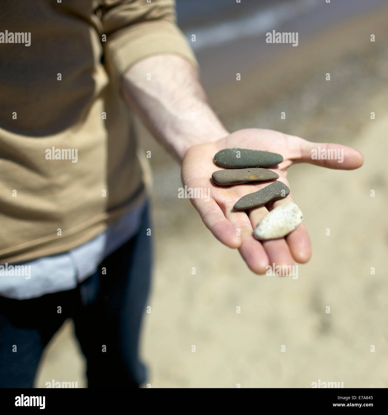 Man holding the stone hi-res stock photography and images - Alamy