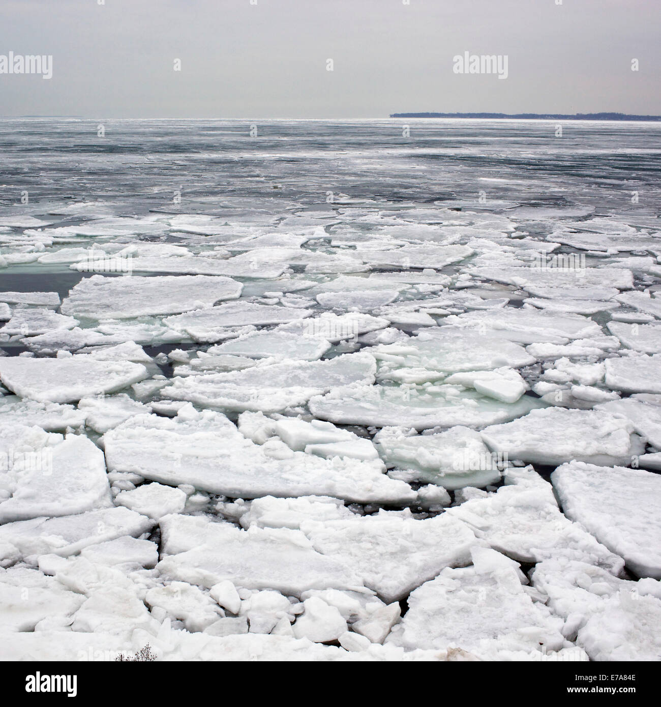 Cracked ice on the surface of a lake Stock Photo - Alamy