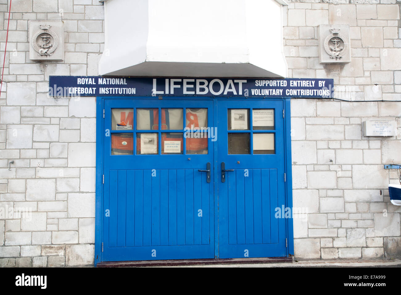 Old lifeboat station blue doors in Weymouth, Dorset, England Stock ...