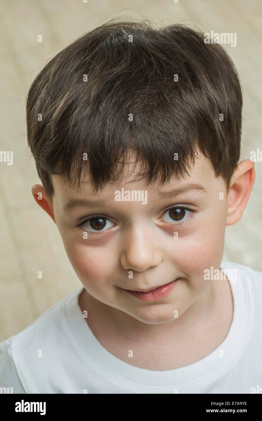 High angle portrait of cute boy at home Stock Photo - Alamy