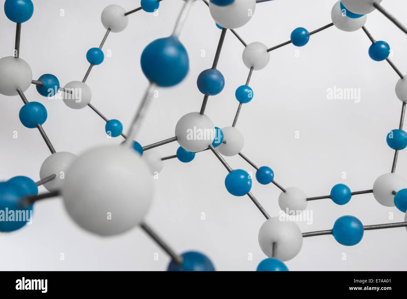 Blue and white molecular structure against white background Stock Photo ...