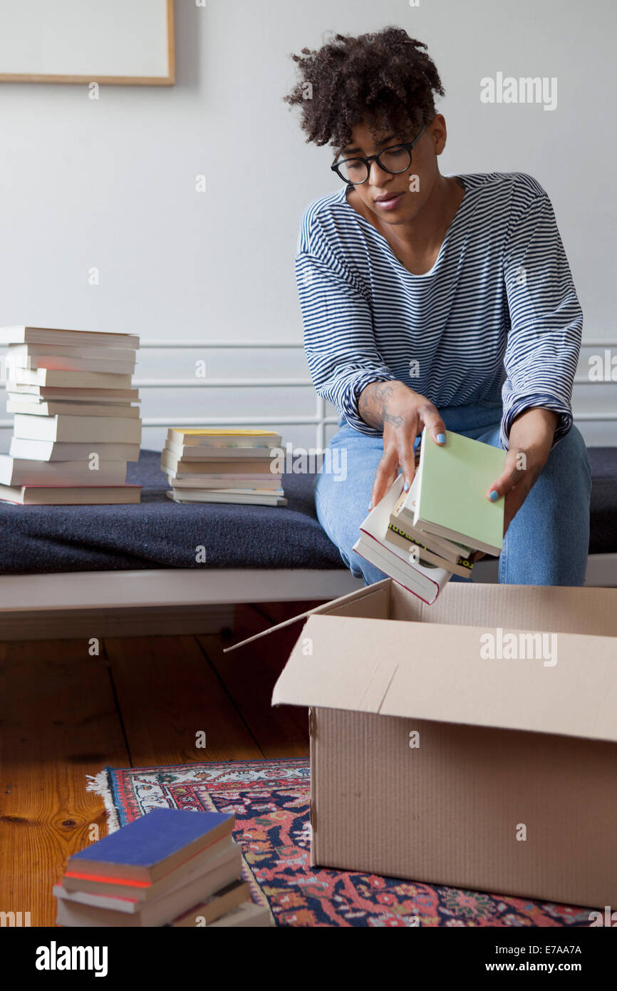 Woman packing cardboard box hi-res stock photography and images - Alamy