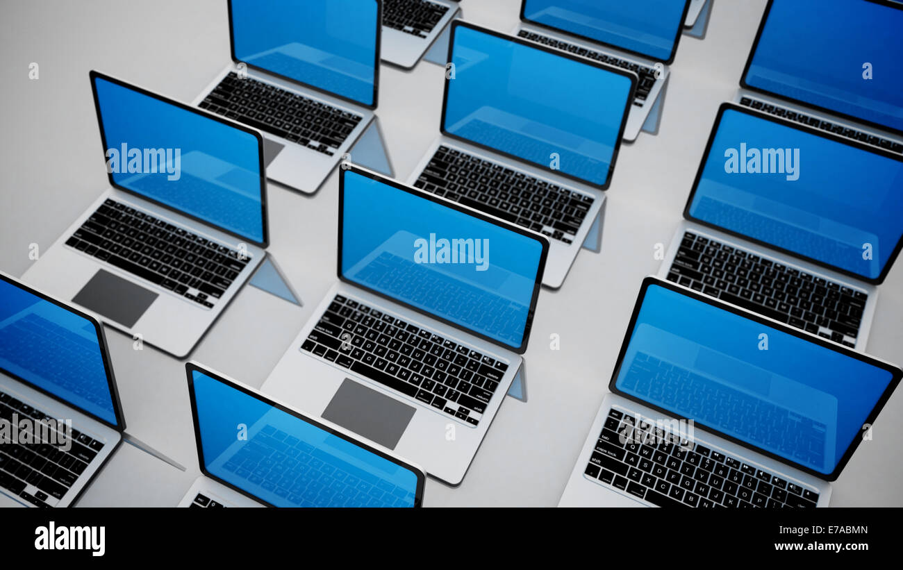 3d image of a lot of laptops in a rows on grey background Stock Photo ...