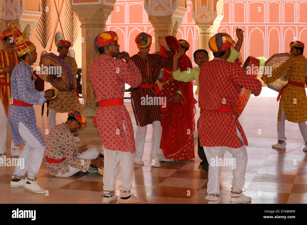 A traditional dance troupe performing in the City Palace of Jaipur, in ...