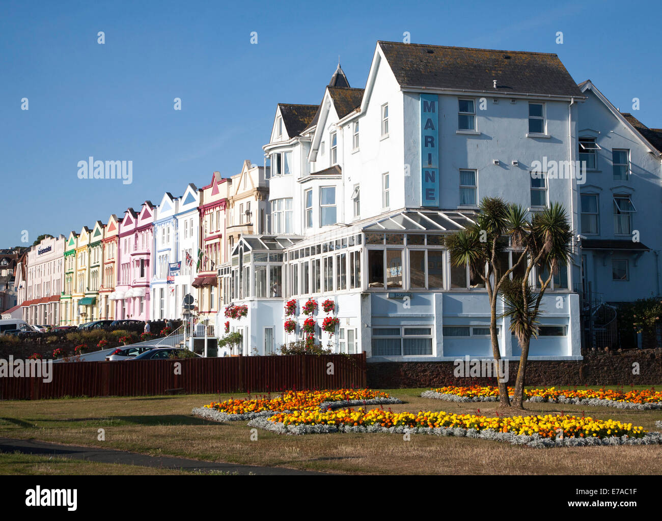 Colourfully painted guesthouses and hotels on the Esplanade, Paignton ...