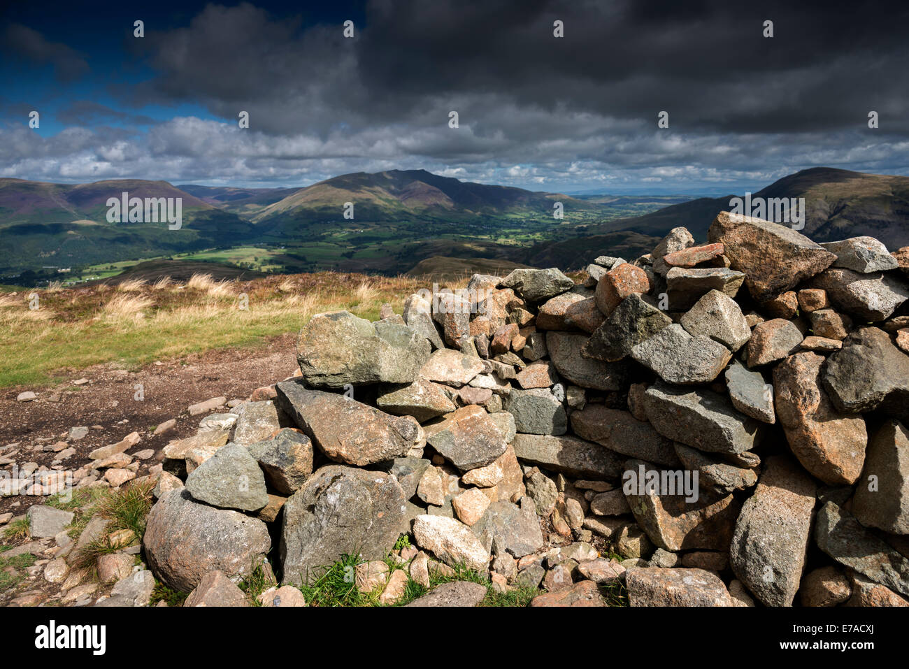 Windbreak made of sandstone on the summit of Bleaberry Fell Lake ...