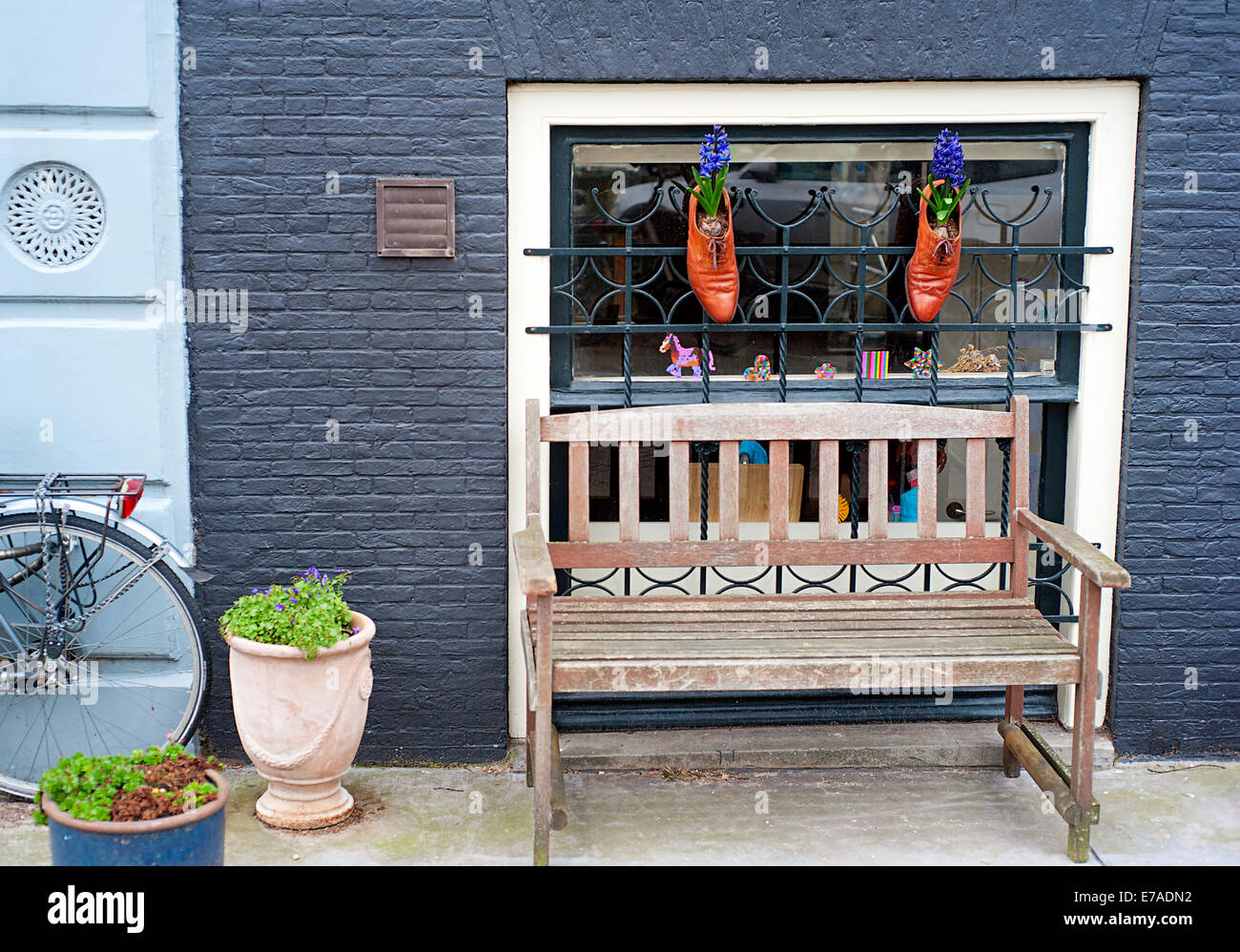 Wooden bench on the street of Amsterdam, Netherlands Stock Photo - Alamy