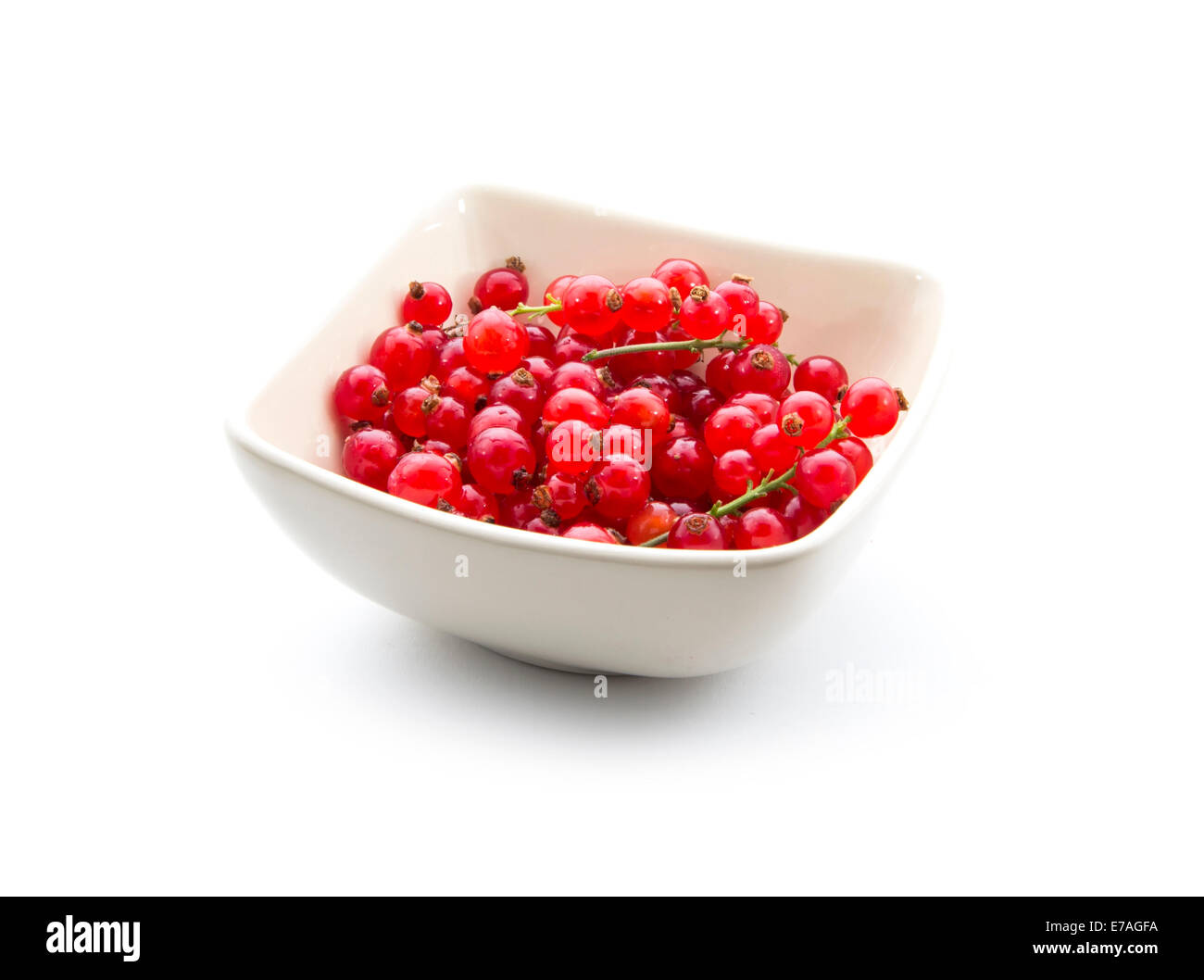fresh currants in bowl isolated on white background Stock Photo - Alamy