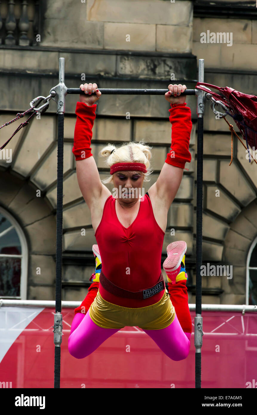 "Felicity Footloose" performing an acrobatic balancing/knife juggling ...