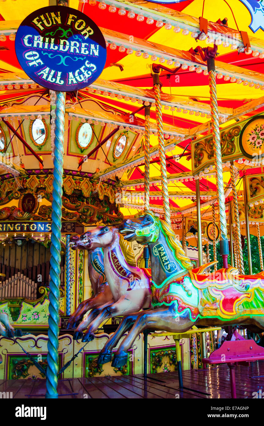 View of Carousel with horses on a carnival Merry Go Round Stock Photo ...