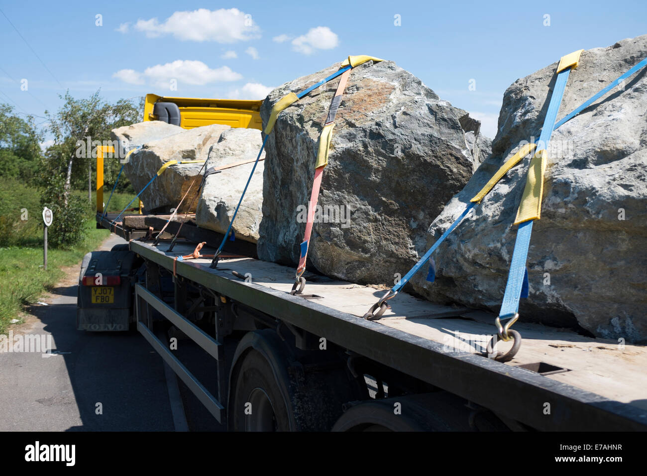 HGV Lorry Huge rocks Boulders Big Flat Back Heavy Stock Photo - Alamy