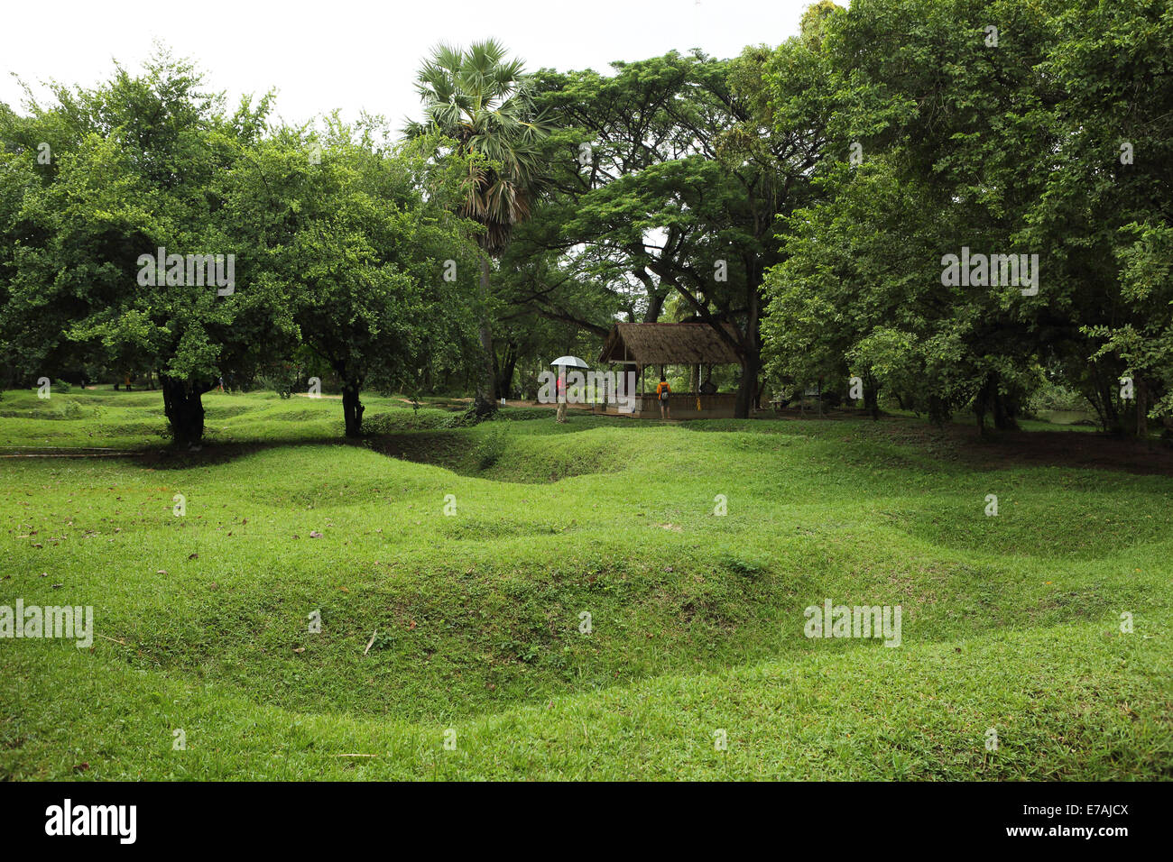 The killing fields at the Choeung Ek Genocide Memorial near Phnom Penh ...