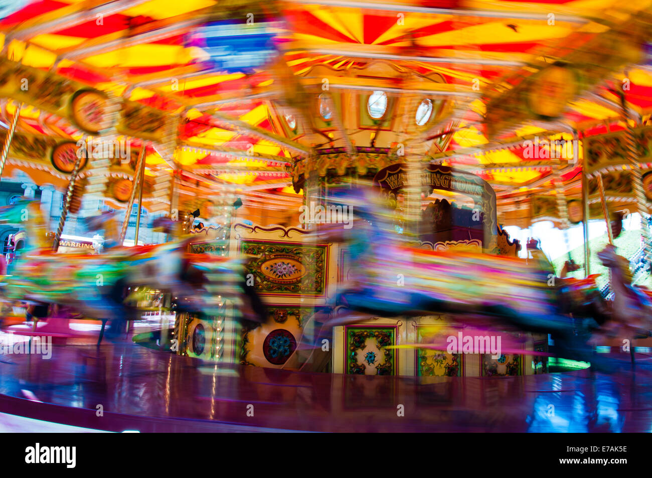 View of Carousel with horses on a carnival Merry Go Round Stock Photo ...