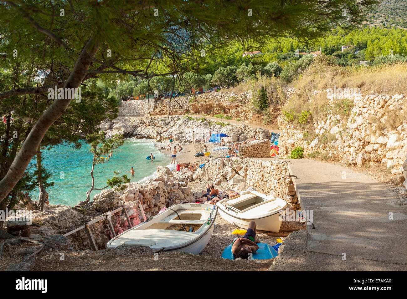 Tourists on a beach near Paklina campsite in Ivan Dolac village, Hvar ...