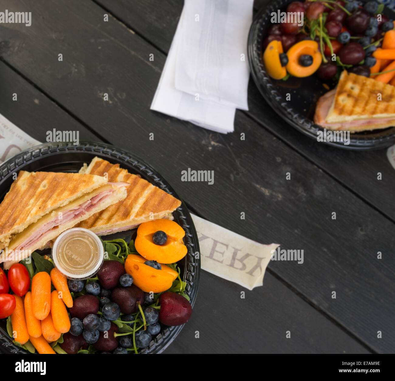 Two plates of food on opposite corners of the image Stock Photo - Alamy