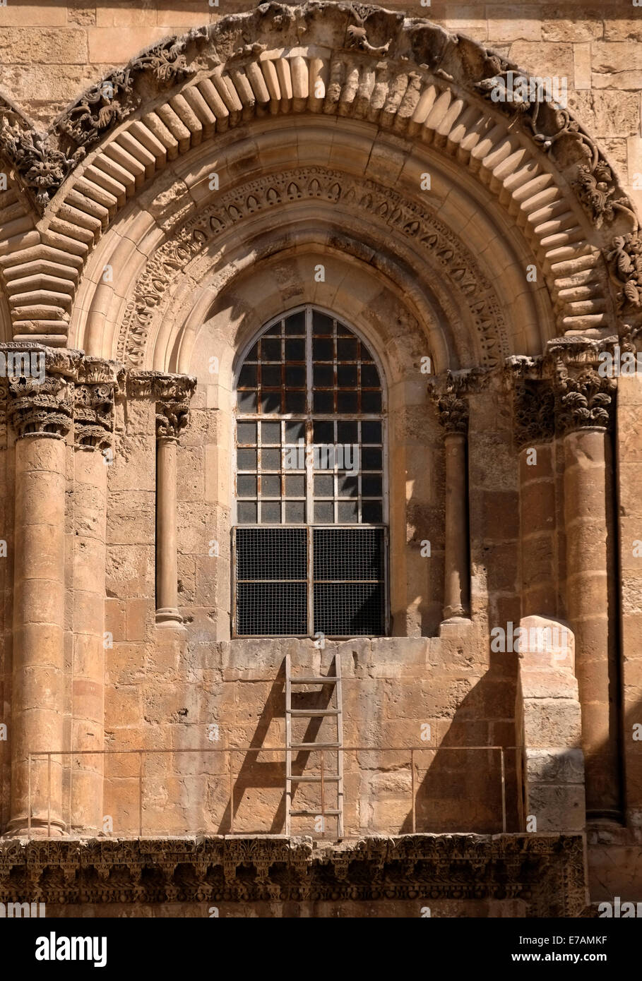 The immovable ladder which leans against a window ledge in the upper ...