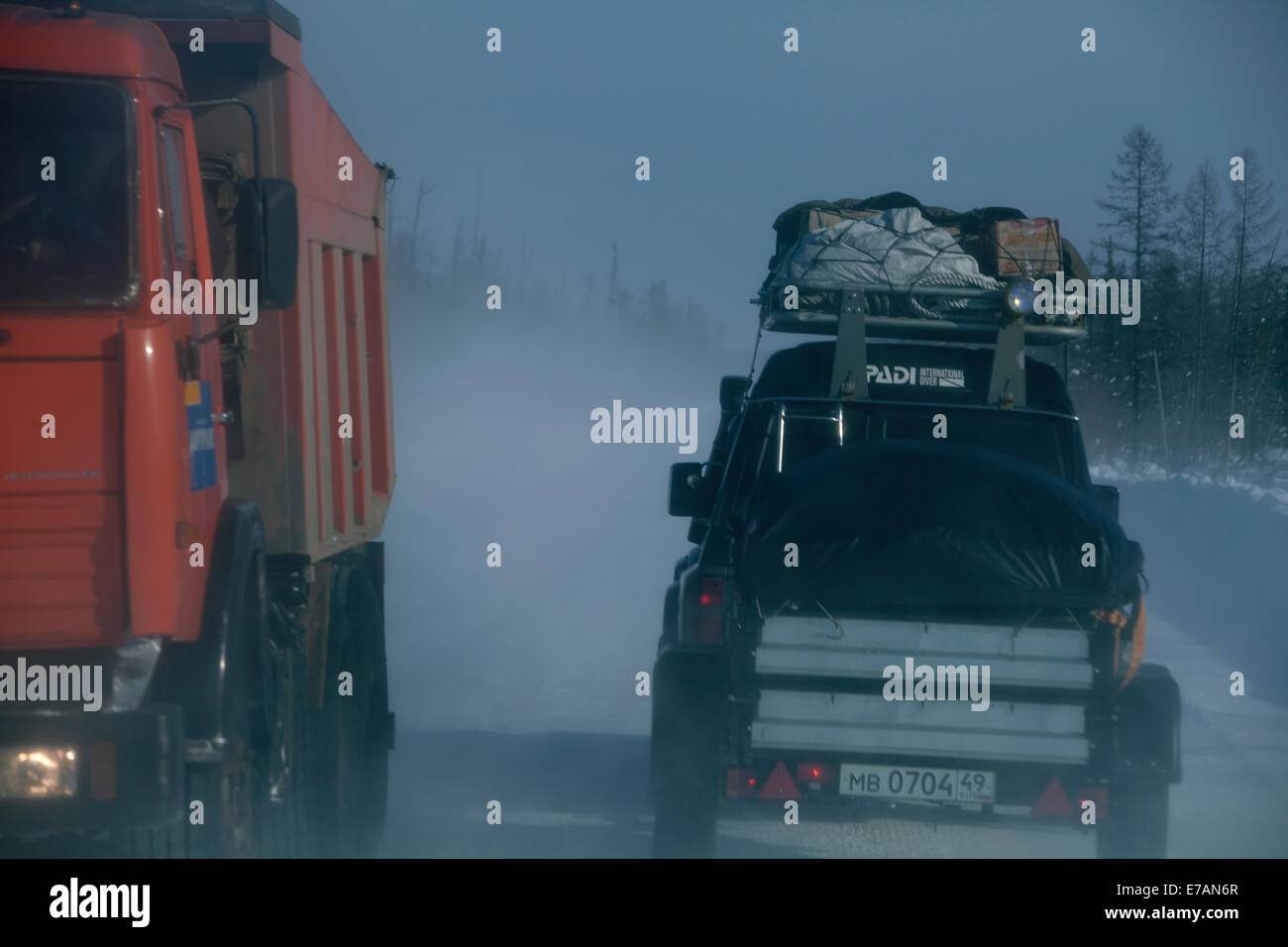 4wd expedition Russian truck on snow ice road Stock Photo - Alamy