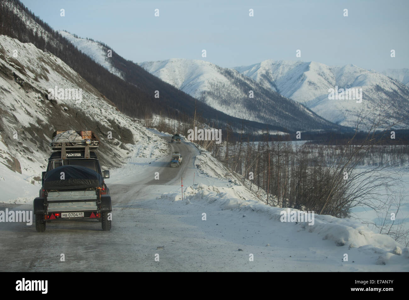4wd expedition snow mountains ice road desolate Stock Photo - Alamy