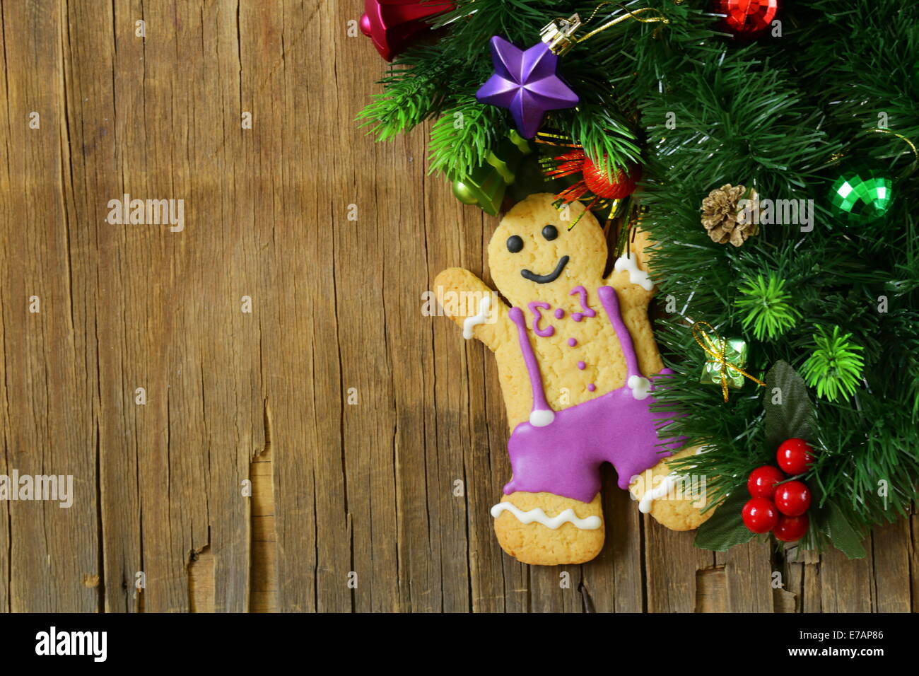 traditional Christmas gingerbread man with festive decorations and ...