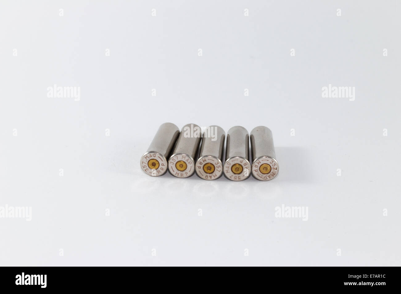 Five fired cartridge cases, caliber .357 Magnum, silver color Stock ...