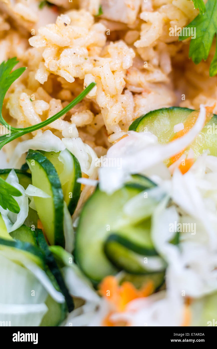 Delicious rice with pork meat and salad Stock Photo - Alamy