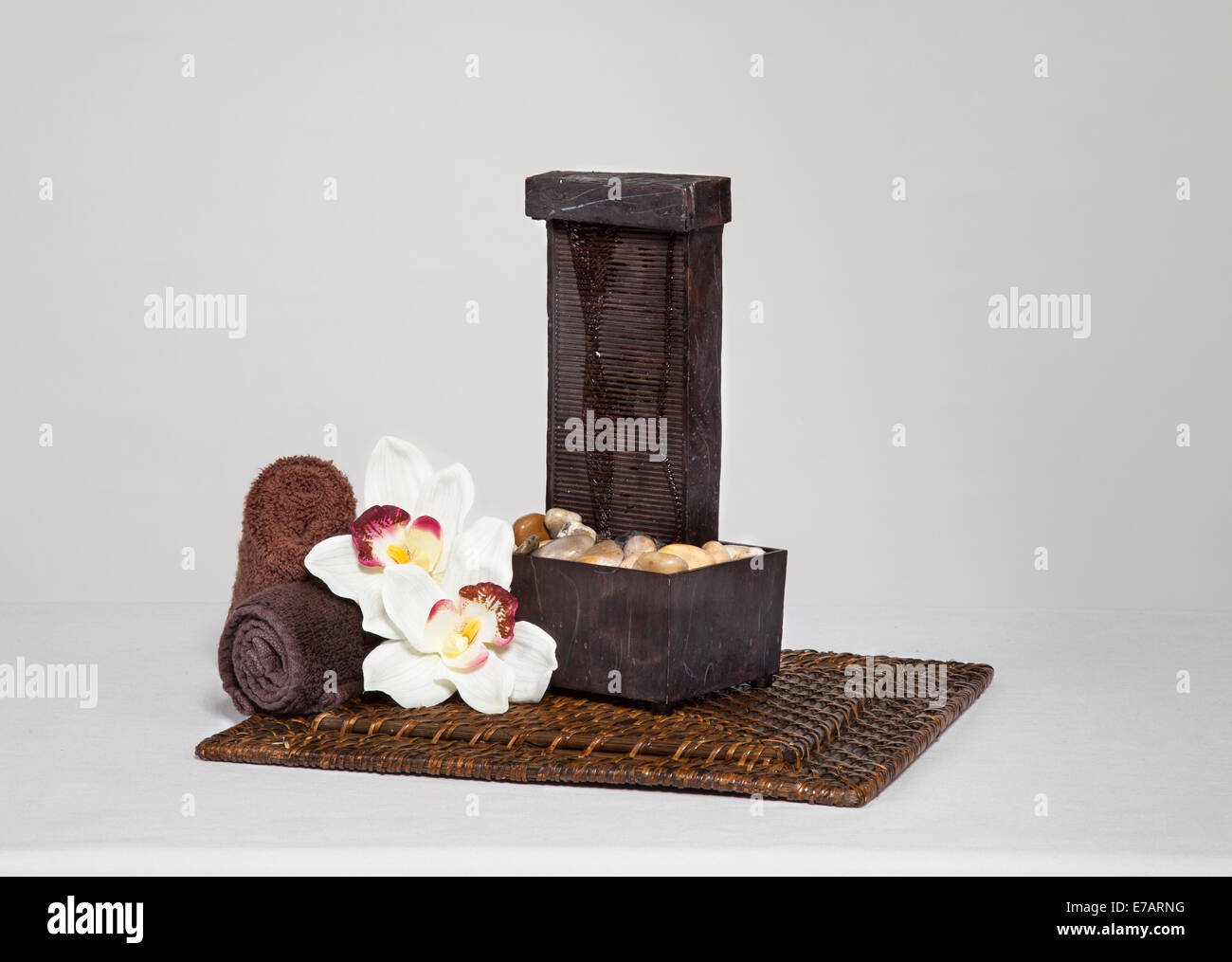 A view of a still life set up composed of flowers and a decorative ...