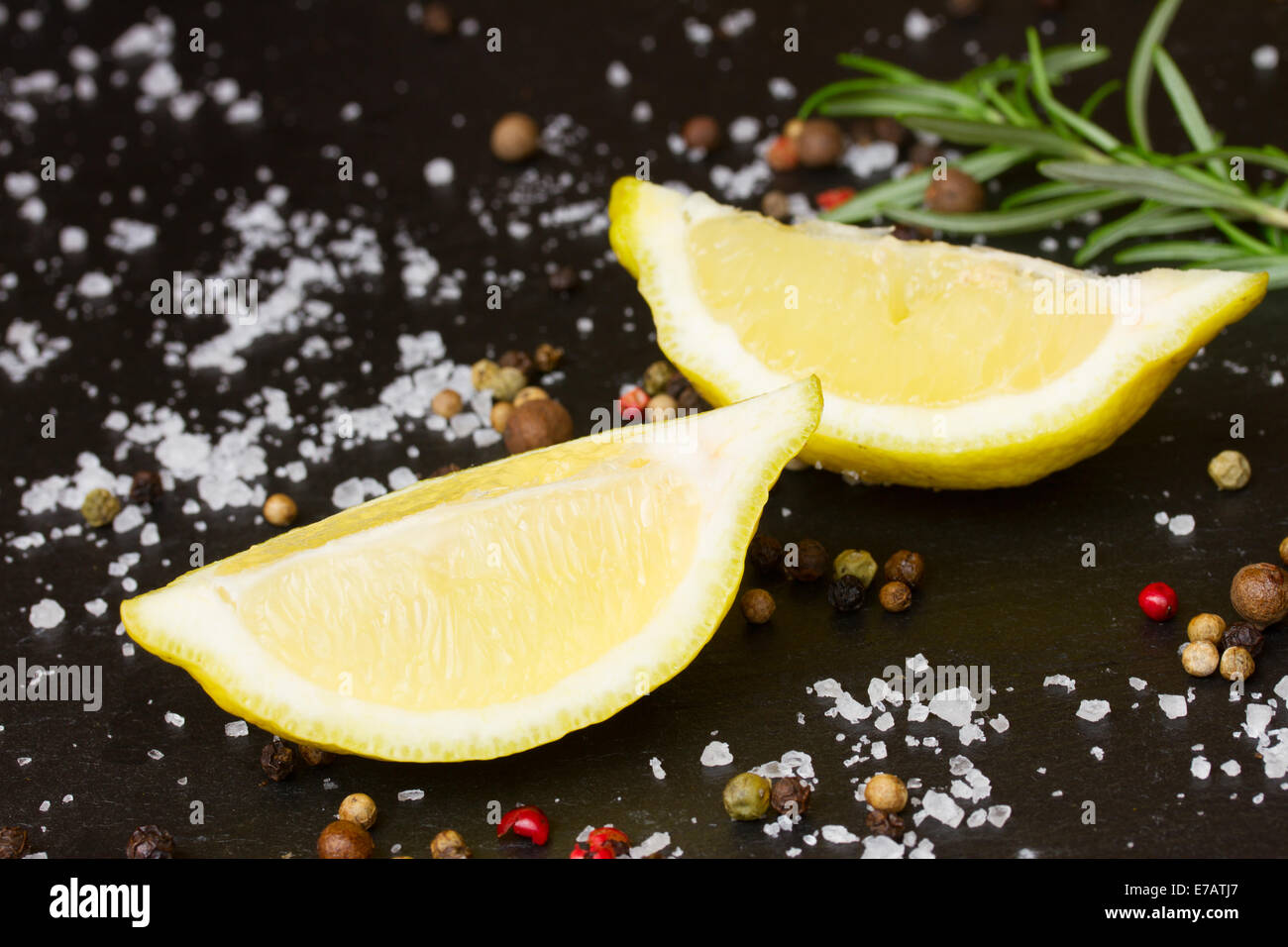 sliced lemon with mix of spices Stock Photo - Alamy
