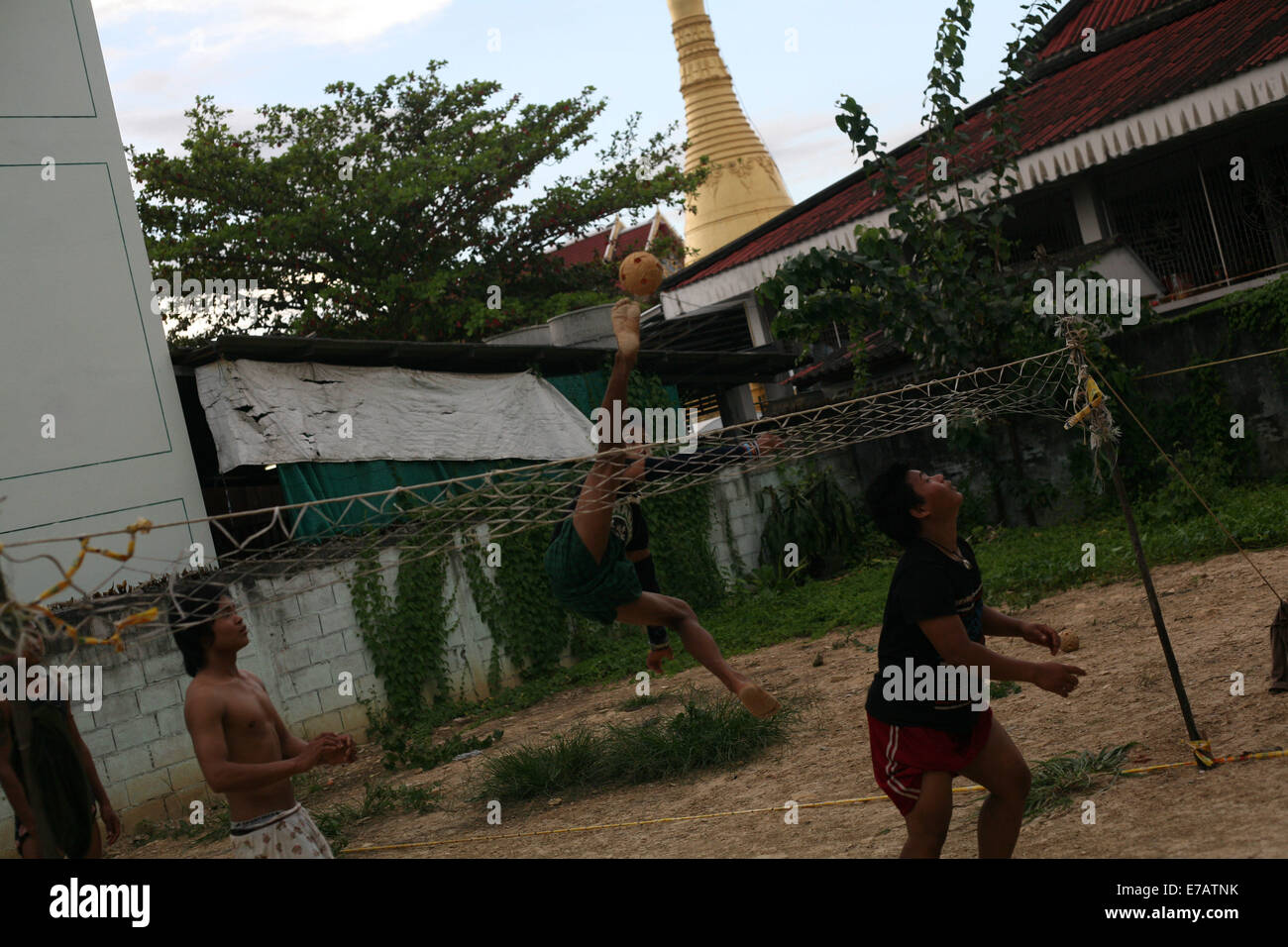 Mae Sot, Thailand. 11th Sep, 2014. Burmese migrant workers, playing ...