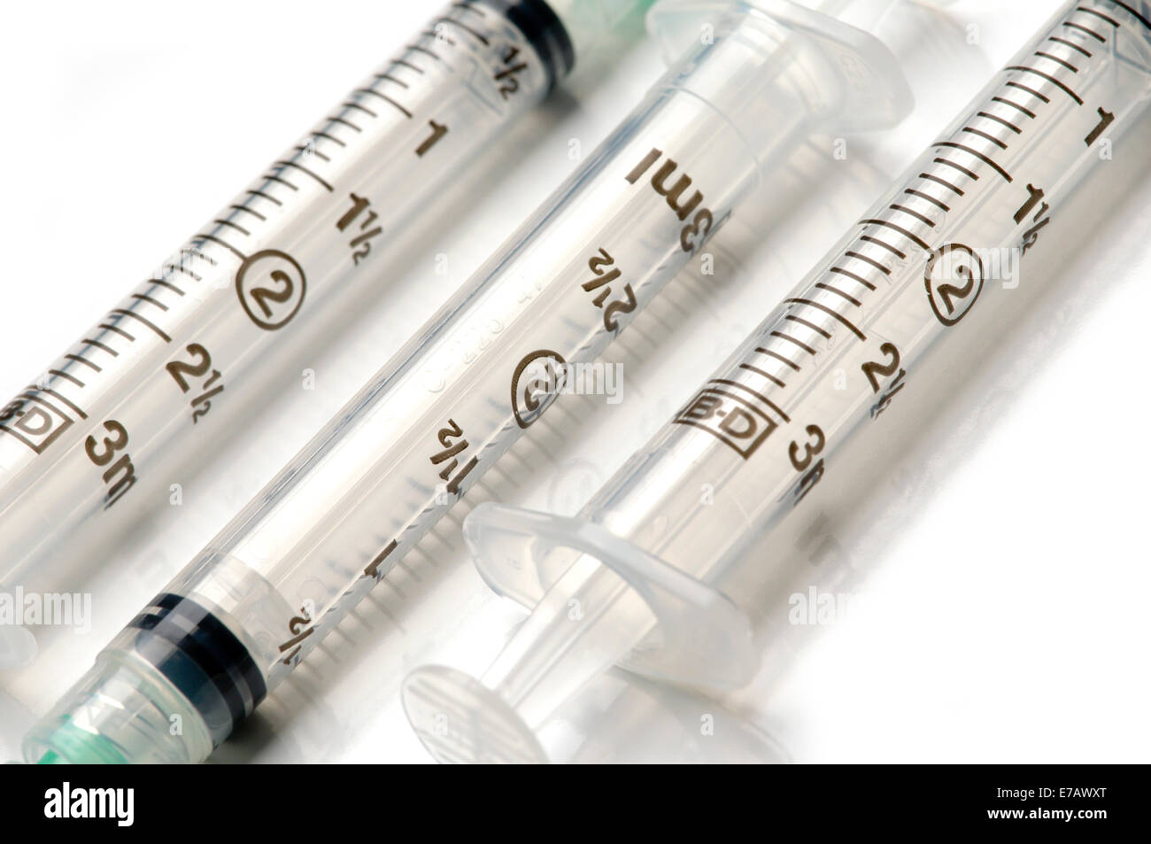 Medical syringes on white Stock Photo - Alamy